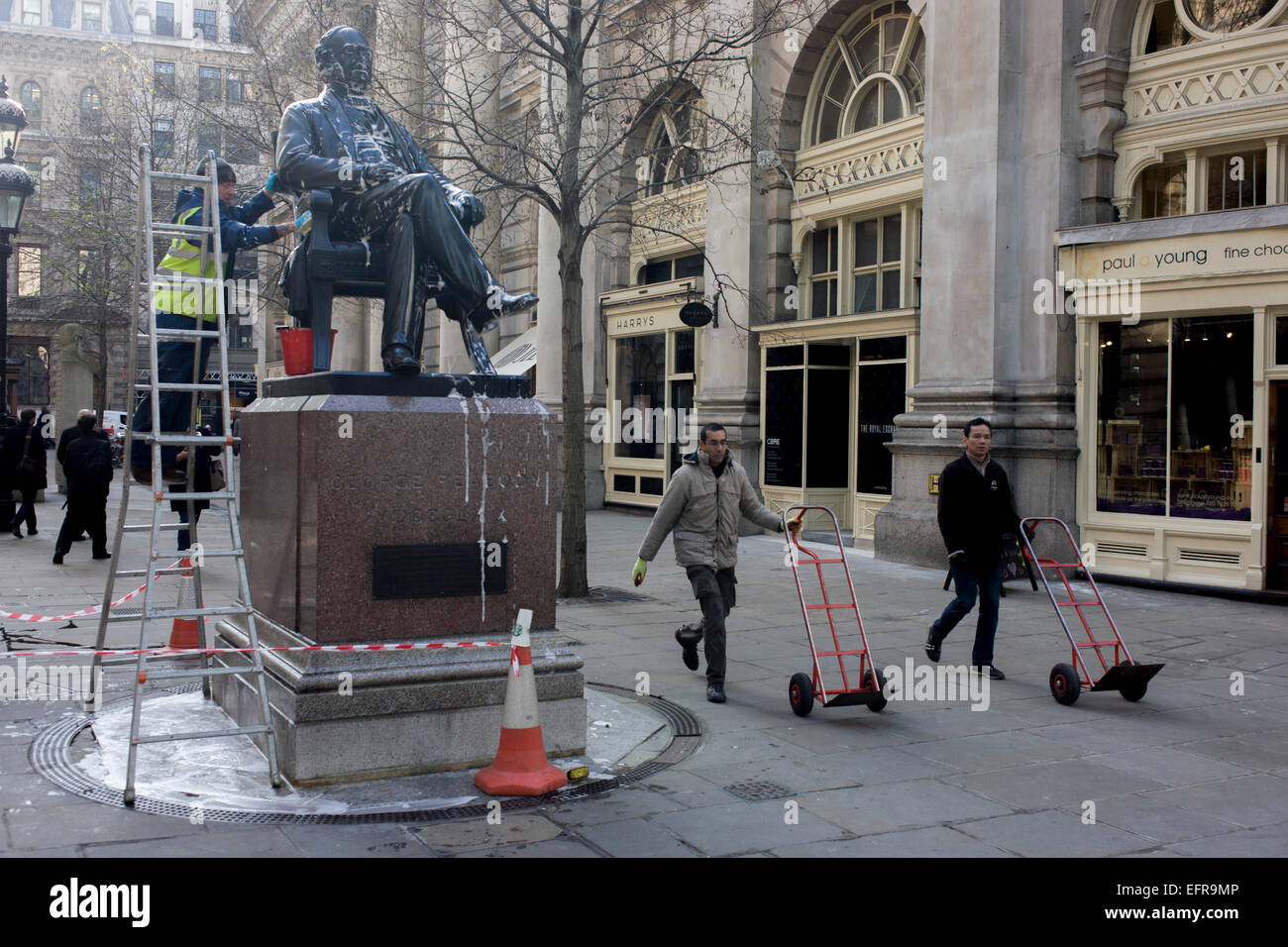 A conservator with City of London contractor Rupert Harris Conservation ...
