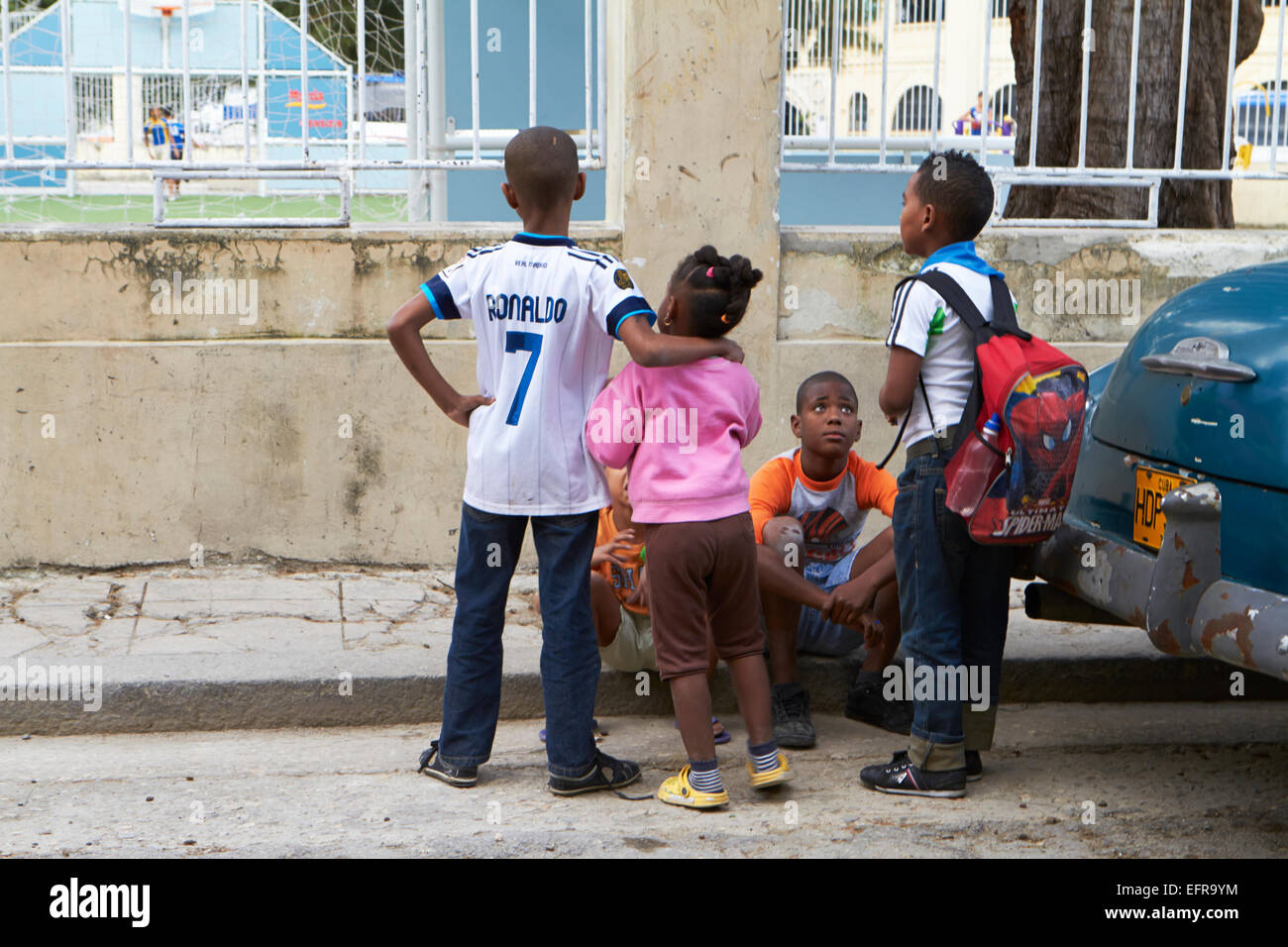 Kids on street, Cuba Stock Photo - Alamy