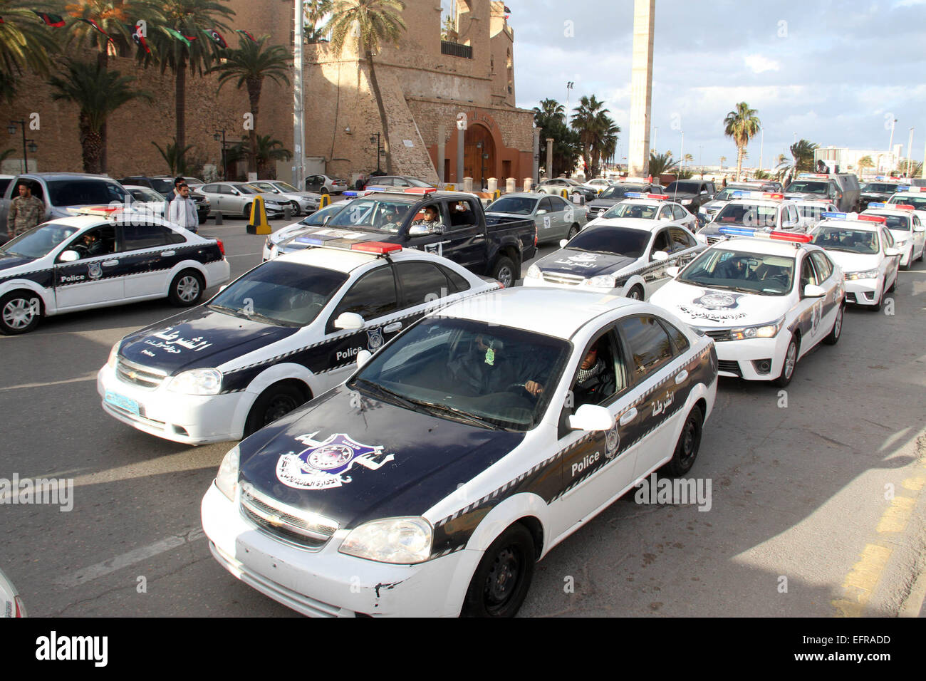 Tripoli. 9th Feb, 2015. Police cars are parked on Martyrs Square before ...