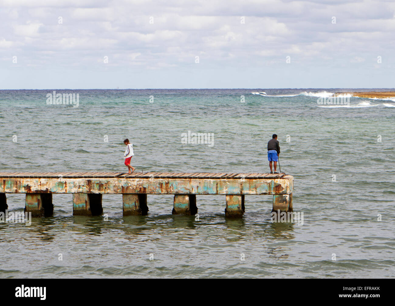 Locals fishing, Cuba Stock Photo - Alamy
