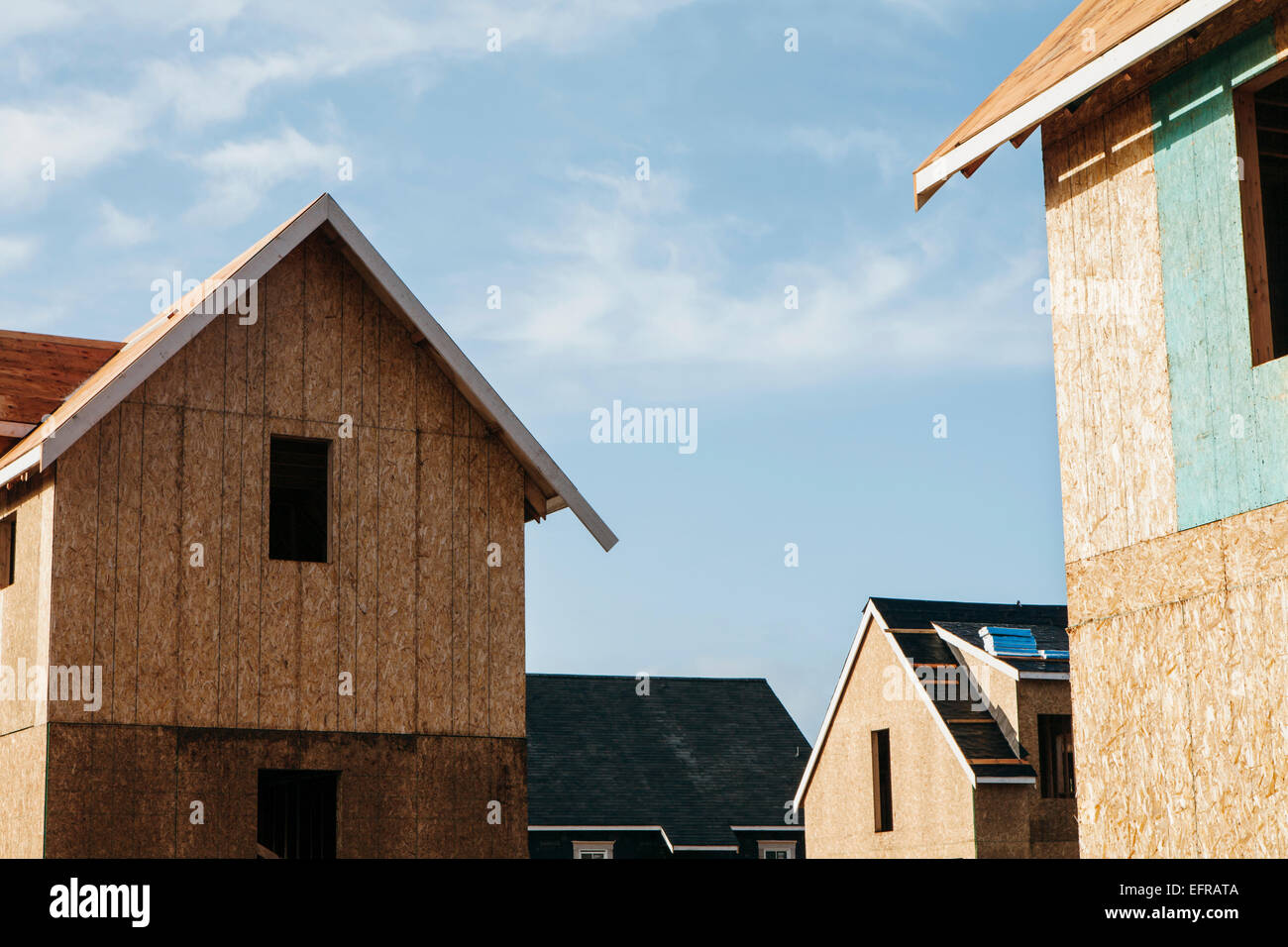 Homes under construction in suburban housing development Stock Photo ...