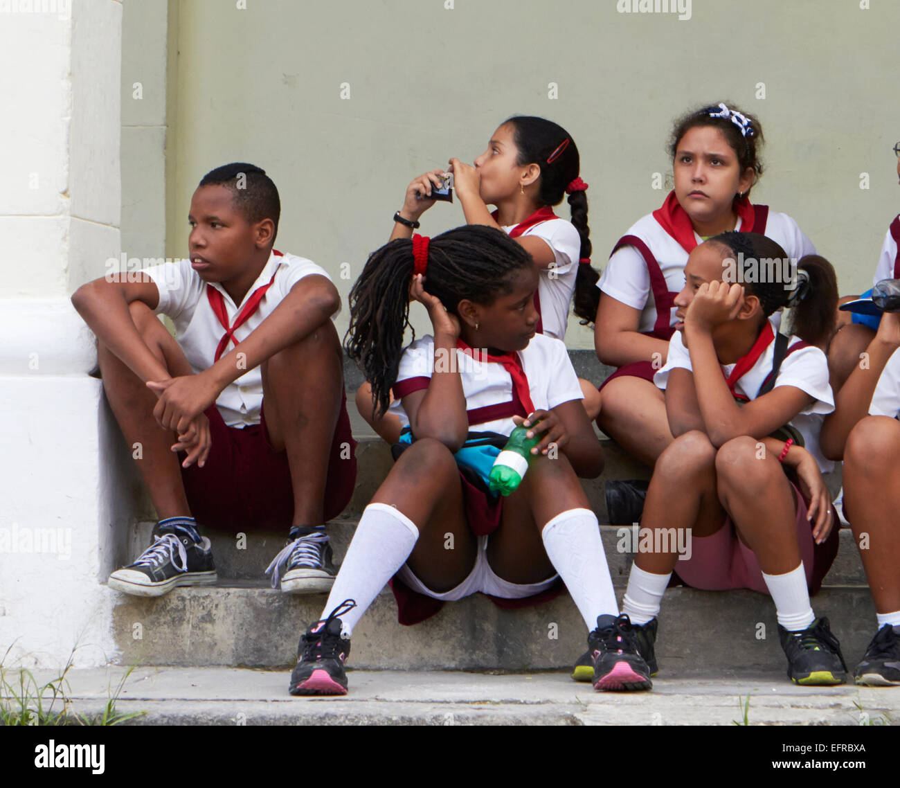 School kids sitting, Cuba Stock Photo - Alamy