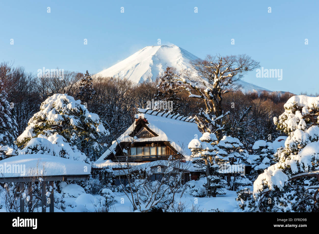 Buildings and mount fuji covered with snow hi-res stock photography and ...