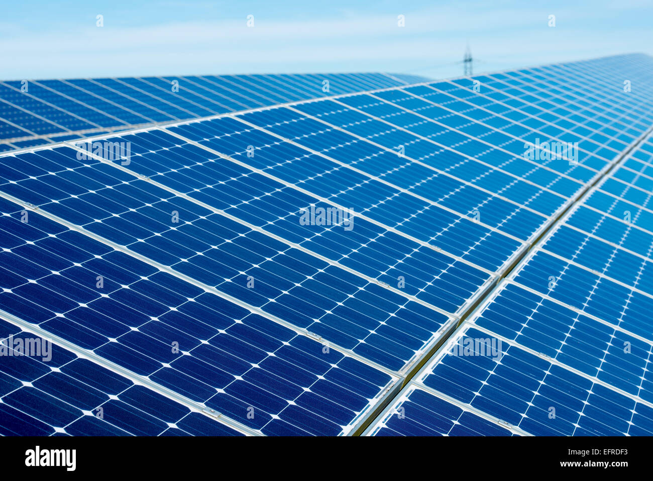 Solar Panels Against The Deep Blue Sky Stock Photo - Alamy
