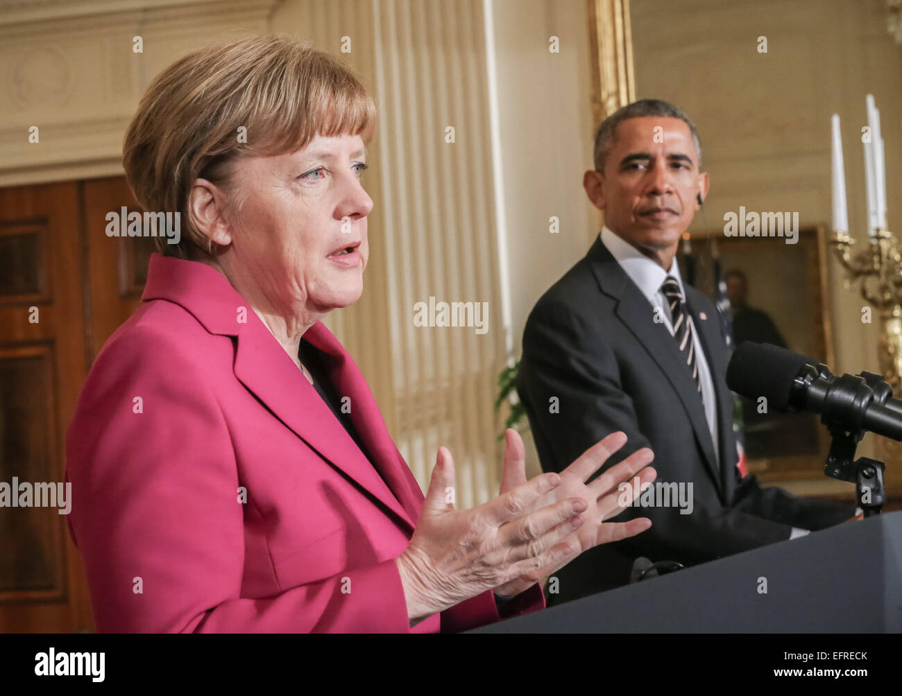 German Chancellor Angela Merkel (CDU) stands next to US President ...