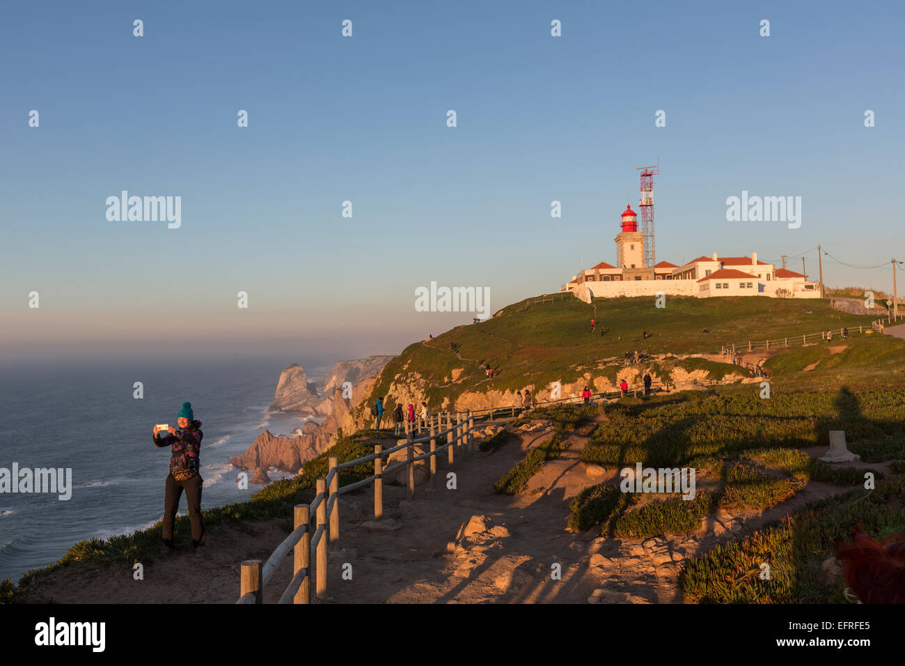 Tourist taking a selfie in the Lighthouse of Cabo da Roca (Cape Roca ...