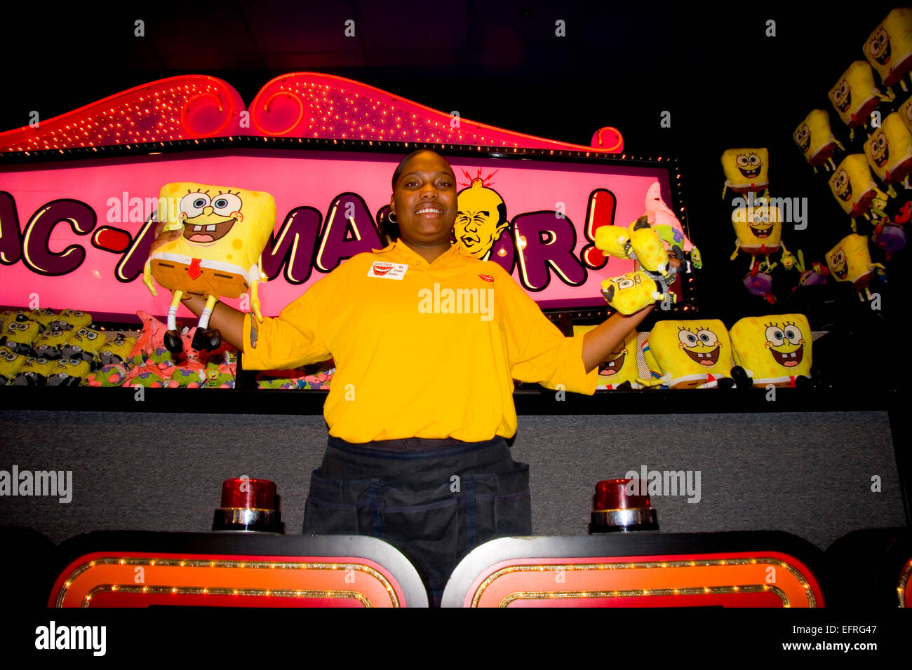 A carnival atmosphere is present at the entrance to the Manhattan ...