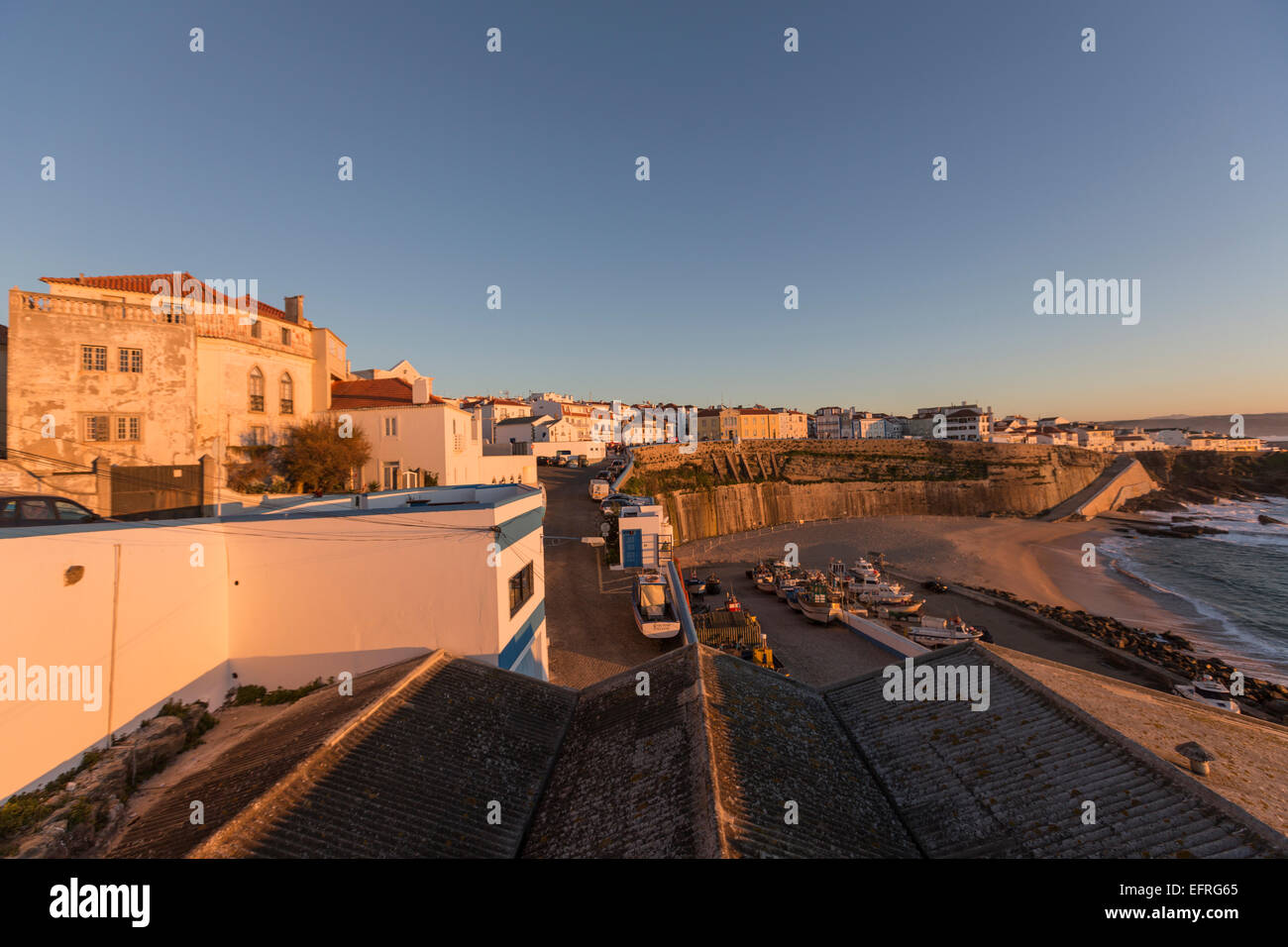 Port of the fishing village of Ericeira at sunset Stock Photo - Alamy