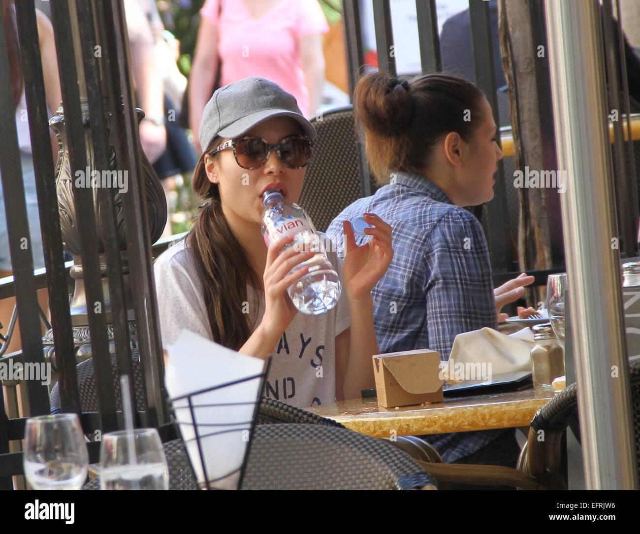 Miranda Cosgrove wearing a t-shirt with the logo 'Always and Forever ...