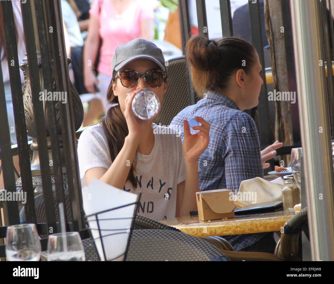 Miranda Cosgrove wearing a t-shirt with the logo 'Always and Forever ...