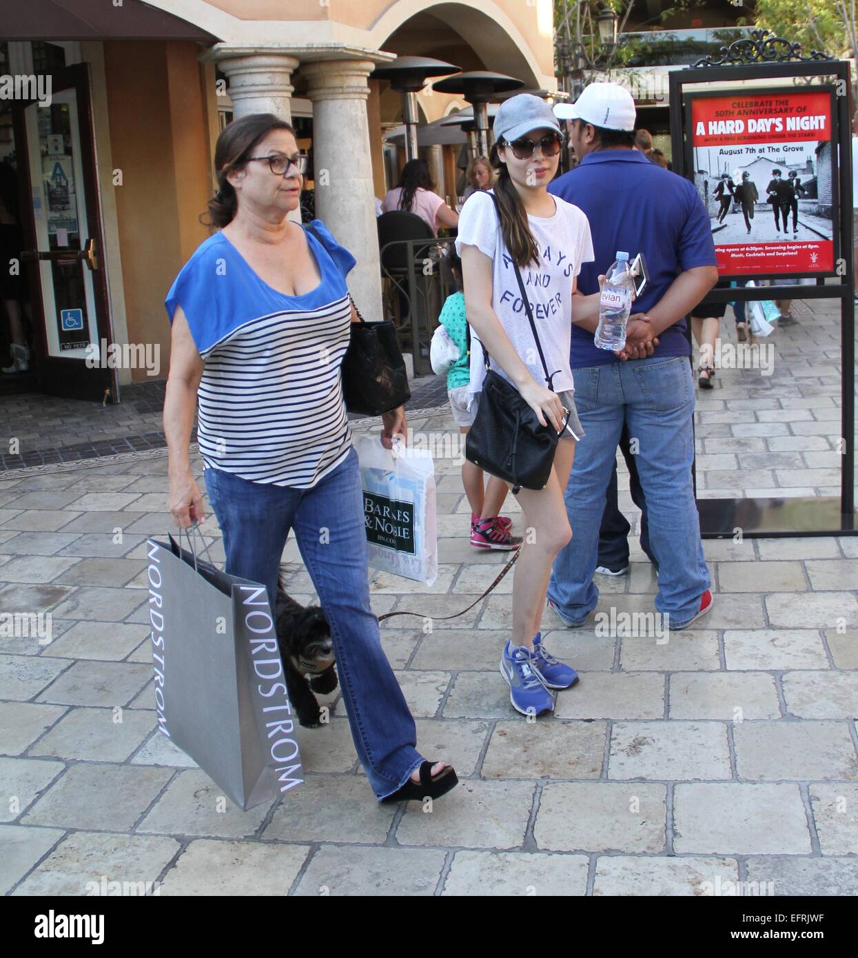 Miranda Cosgrove wearing a t-shirt with the logo 'Always and Forever ...