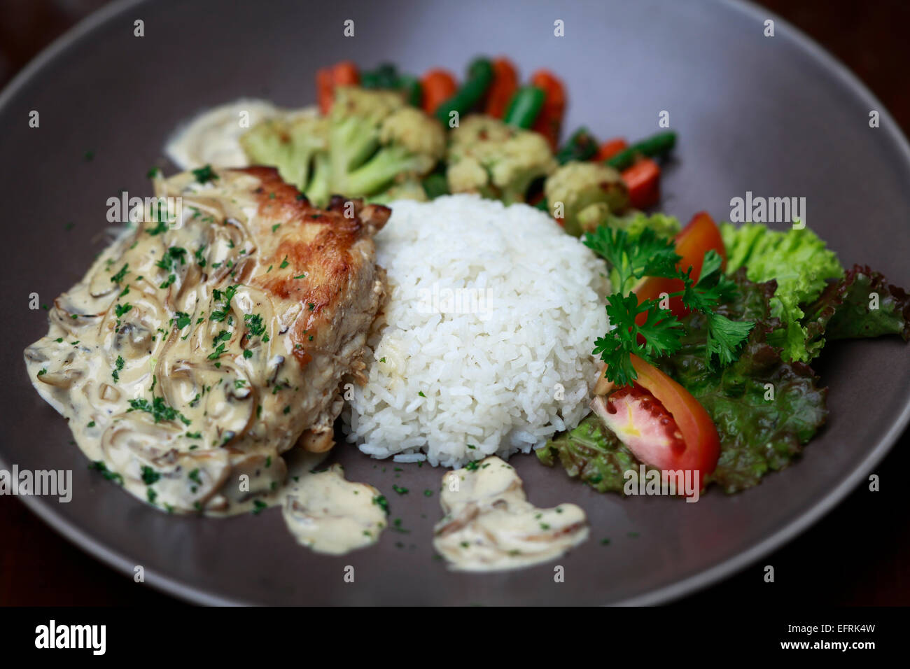 Grilled chicken and rice Stock Photo - Alamy