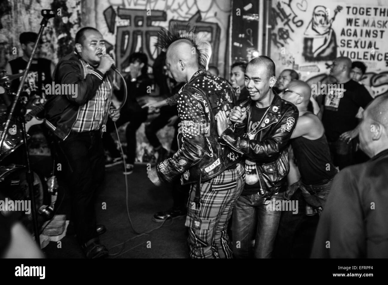 Malaysian Skin head and punks dancing and having fun at a punk gig at ...