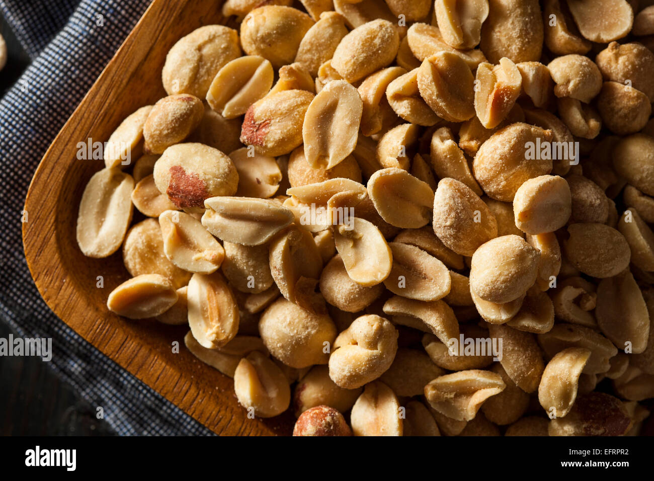 Organic Roasted Salty Peanuts in a Bowl Stock Photo - Alamy