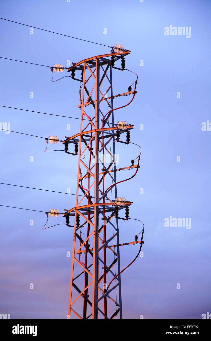 Spanish power pylon in the early morning sunshine, Costa del Sol ...