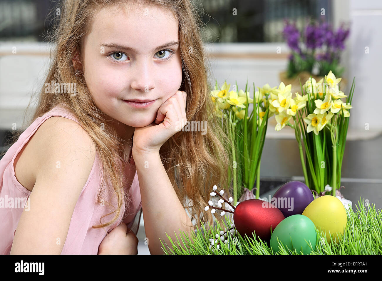 Lovely young girl getting ready for Easter Stock Photo - Alamy