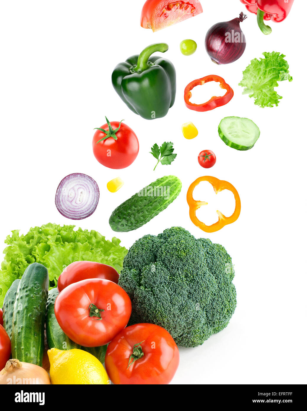 Falling fresh vegetables on white background Stock Photo - Alamy