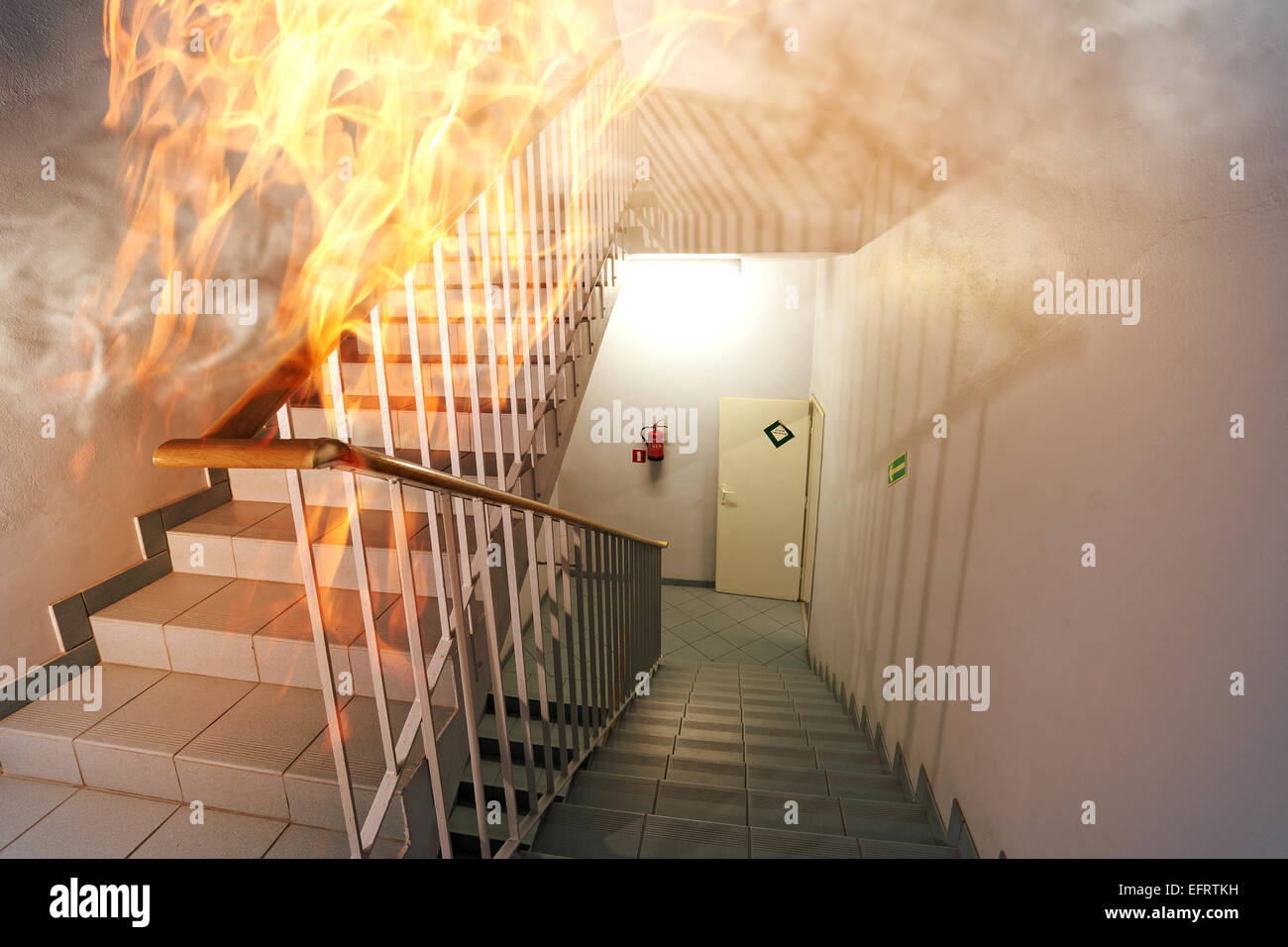 Fire in the staircase in the office Stock Photo - Alamy