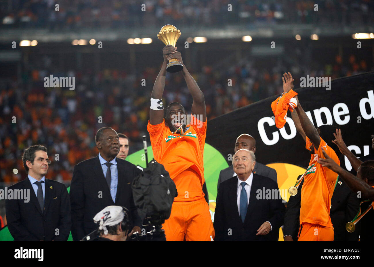 Ivory Coast Captain Yaya Toure lifts a loft the Trophy after defeating ...