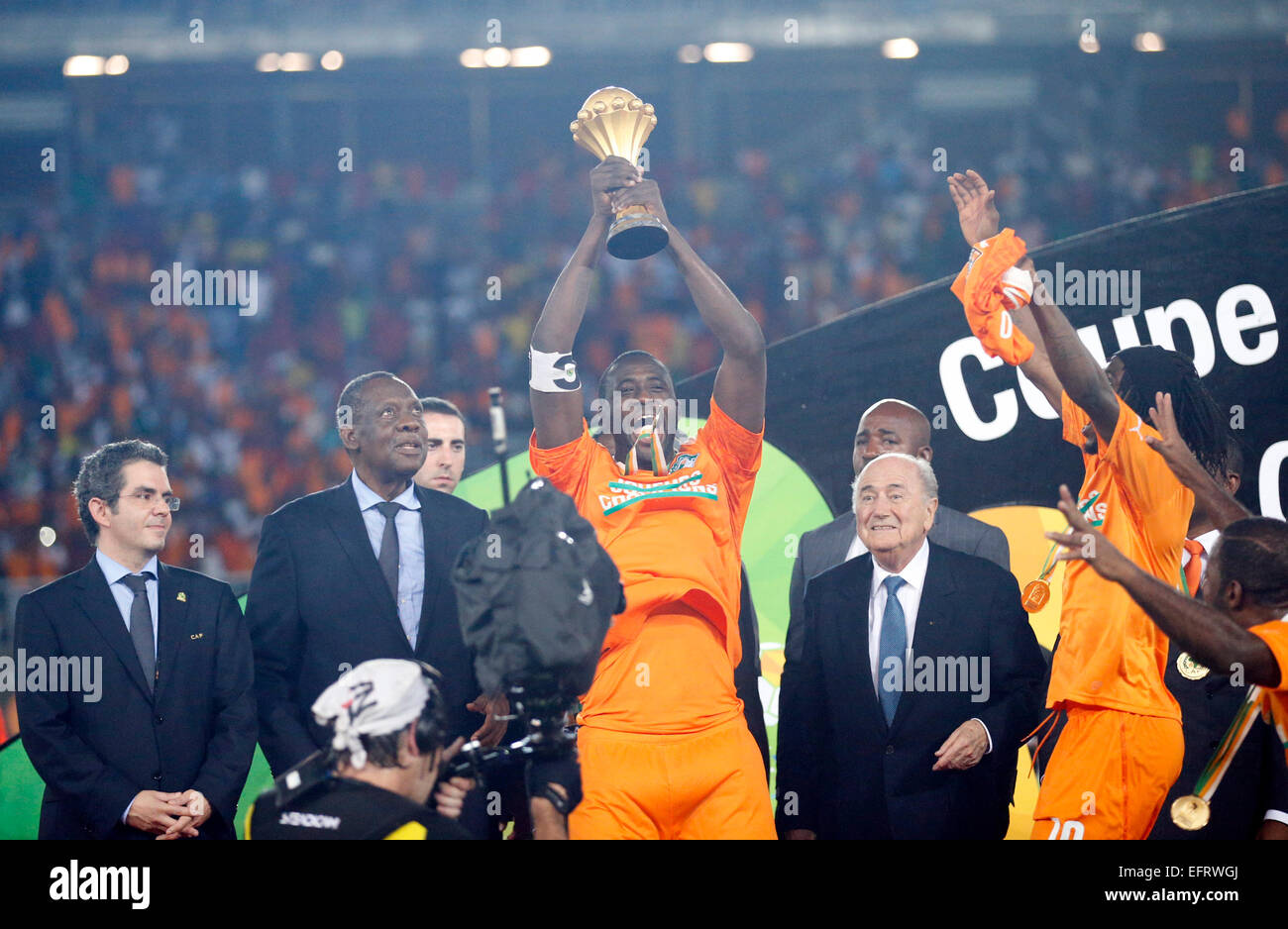 Ivory Coast Captain Yaya Toure lifts a loft the Trophy after defeating ...