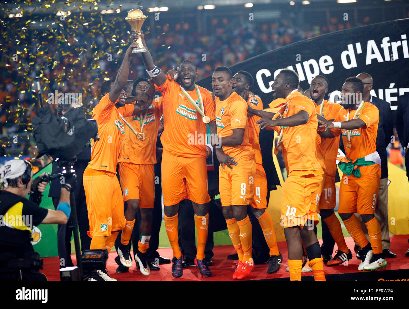 Ivory Coast Captain Yaya Toure lifts a loft the Trophy after defeating ...