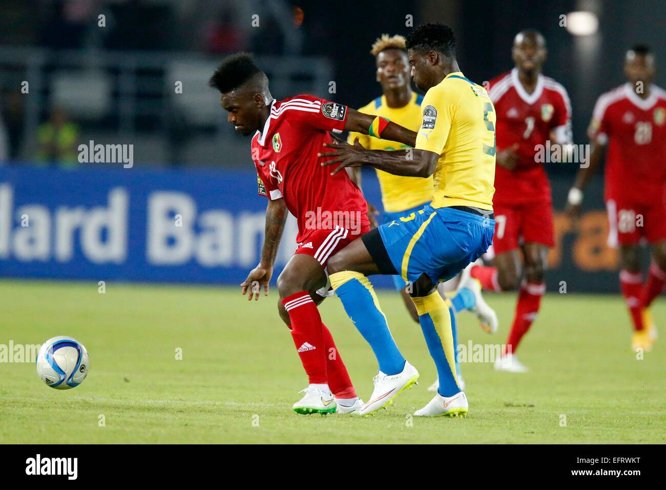 Thievi Bifouma of Congo shields the ball away from Arnold Davy Bauka by ...