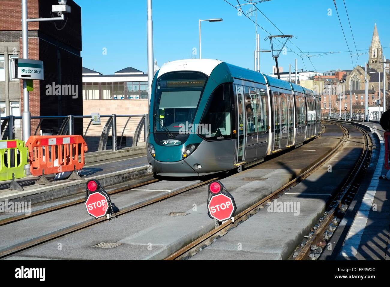 Modern electric tram running on the Nottingham express transit system ...