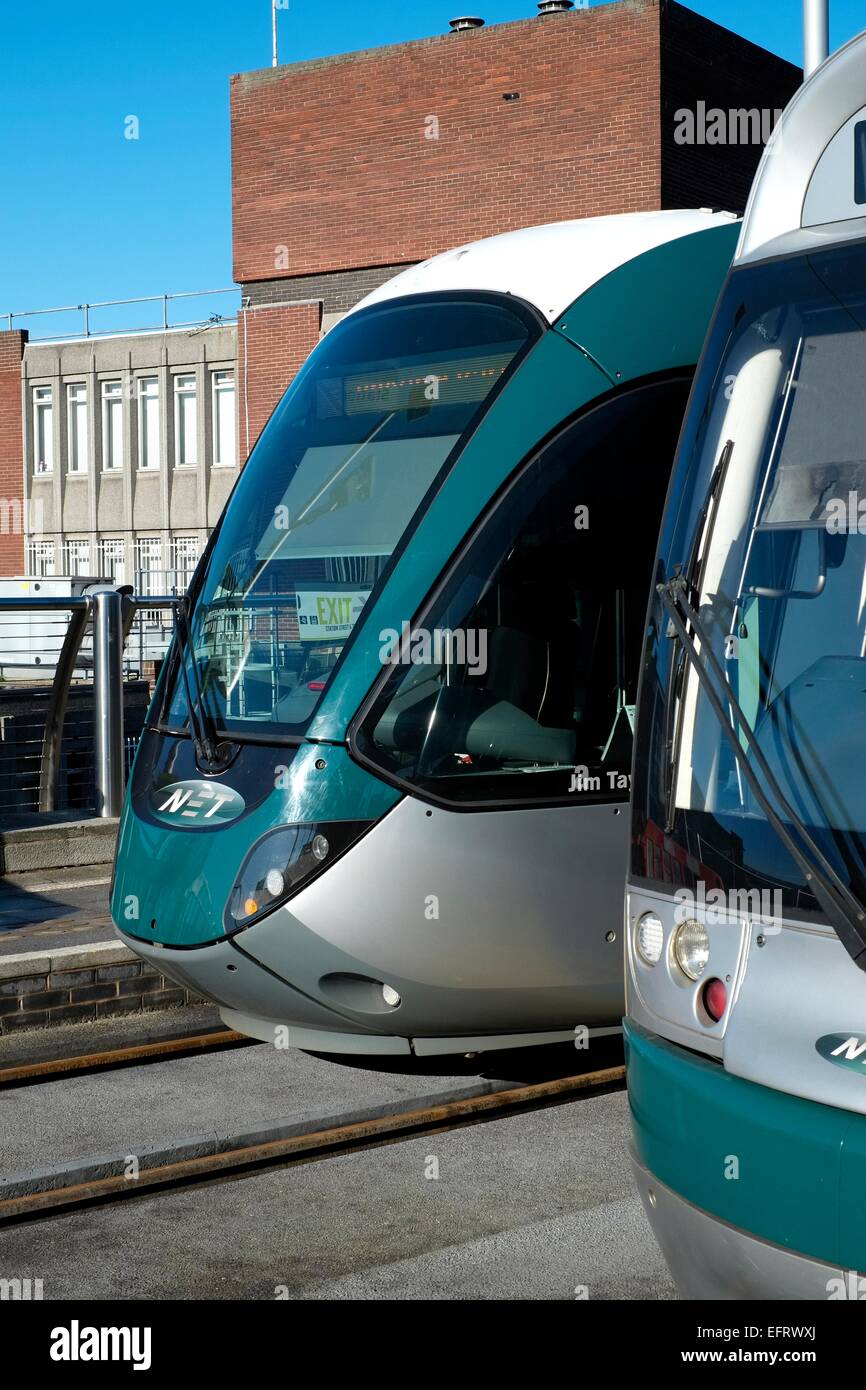 Modern electric trams running on the Nottingham express transit system ...
