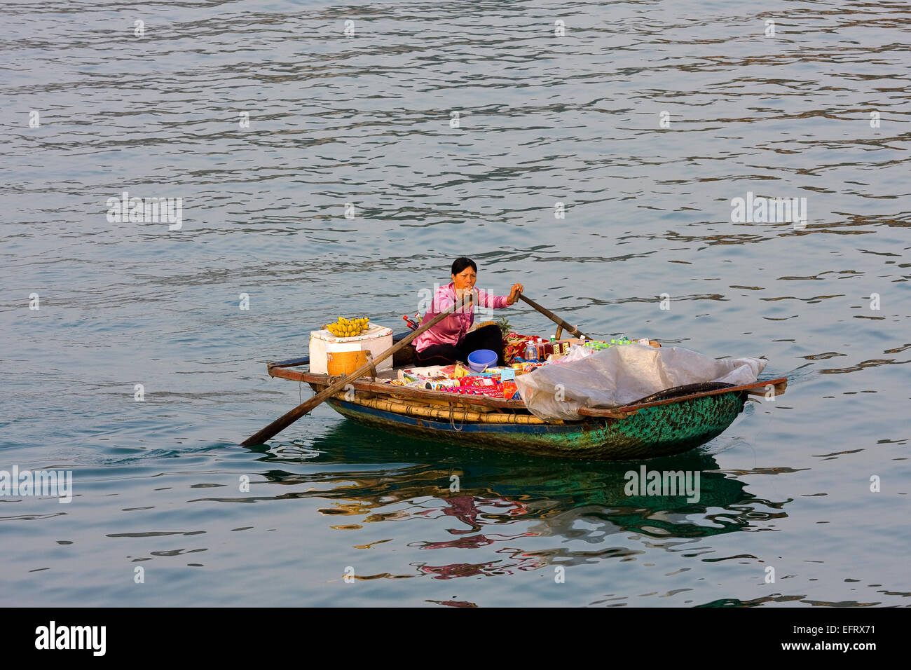 Snack food boat vendor Halong Bay Vietnam Stock Photo - Alamy