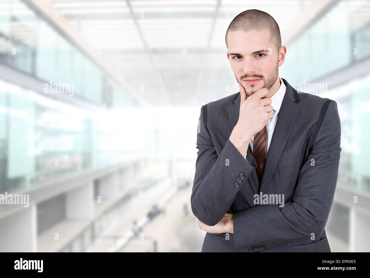 pensive business man thinking at the office Stock Photo - Alamy