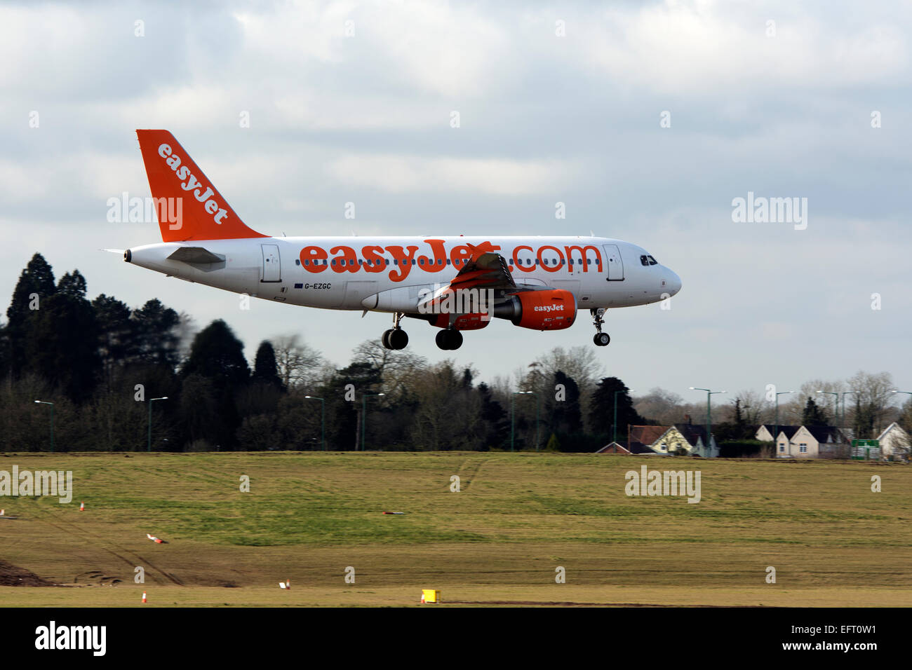 Easyjet Airbus A319 landing at Birmingham Airport, UK (G-EZGC Stock ...