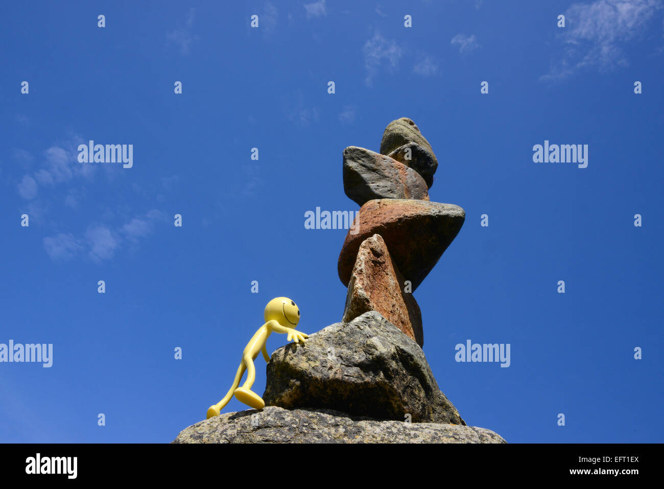Yellow Smiley Man on holiday in the Outer Hebrides - Here he's climbing ...