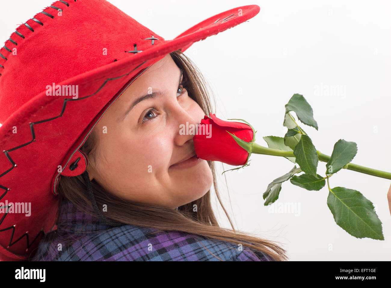 Woman smelling white rose hi-res stock photography and images - Alamy