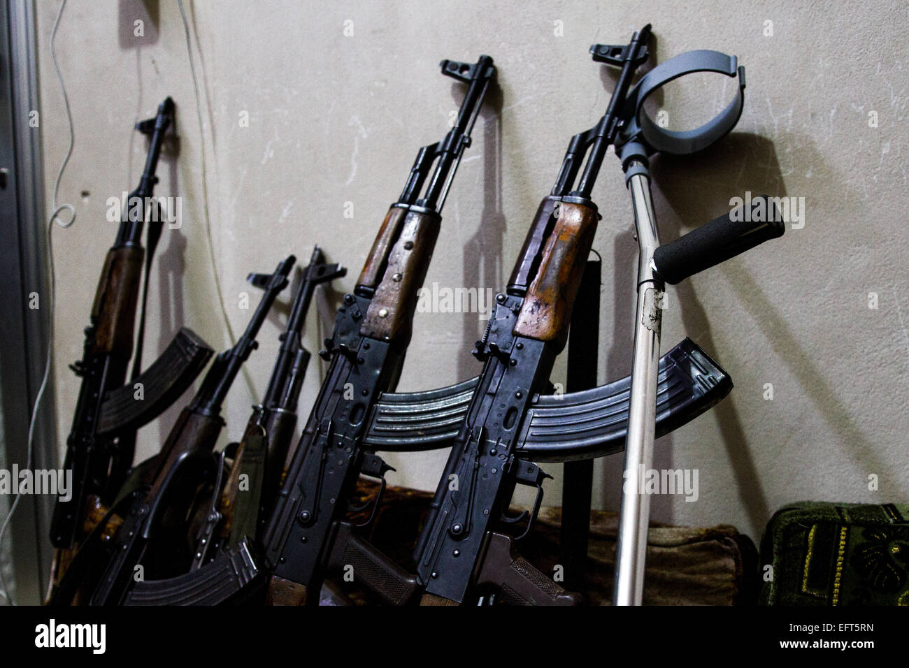 Kobane, Syria. 6th Feb, 2015. Weapons of pro-Kurdish fighters lean ...