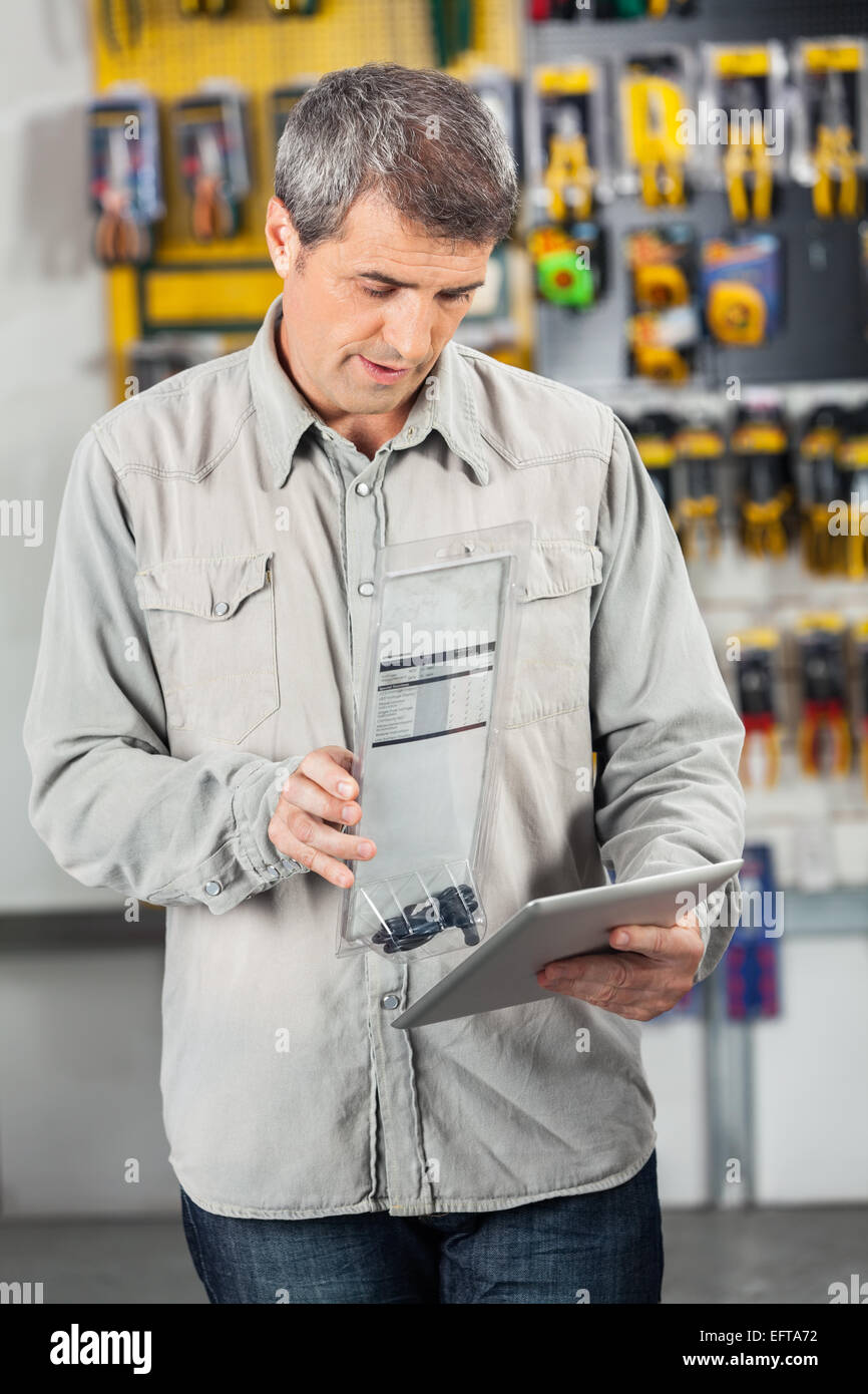 Customer Scanning Product Through Digital Tablet Stock Photo - Alamy