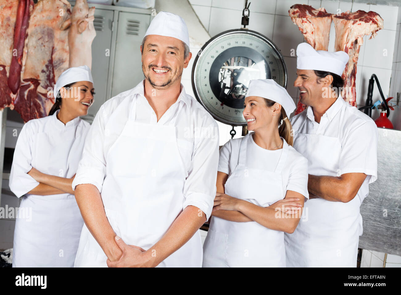 Male Butcher With Team In Butchery Stock Photo - Alamy