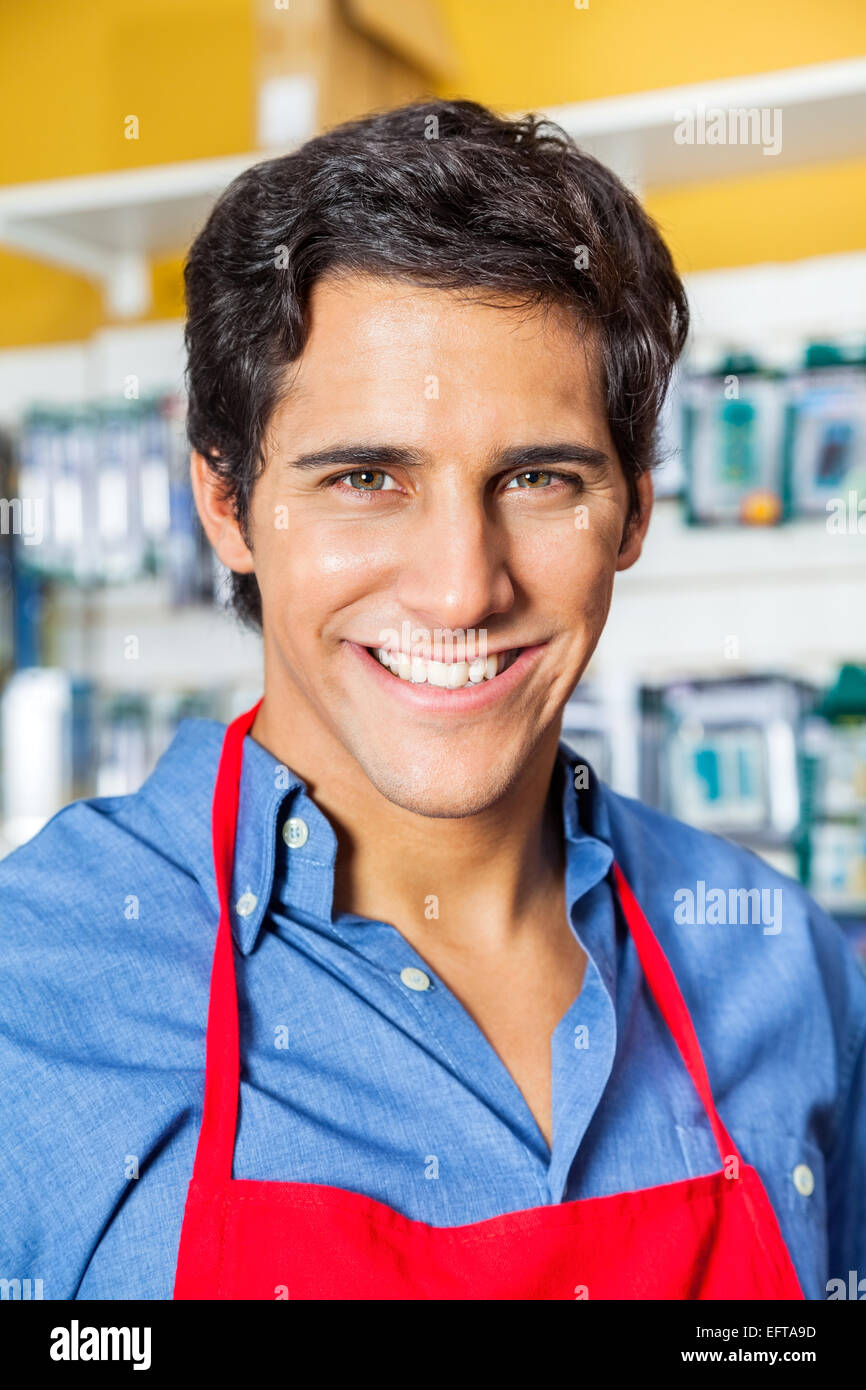 Confident Male Worker Smiling In Hardware Shop Stock Photo - Alamy