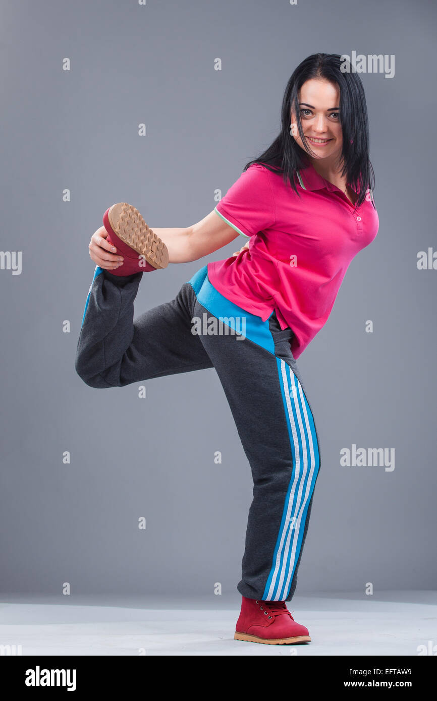 Young and beautiful woman dancer posing in studio Stock Photo - Alamy