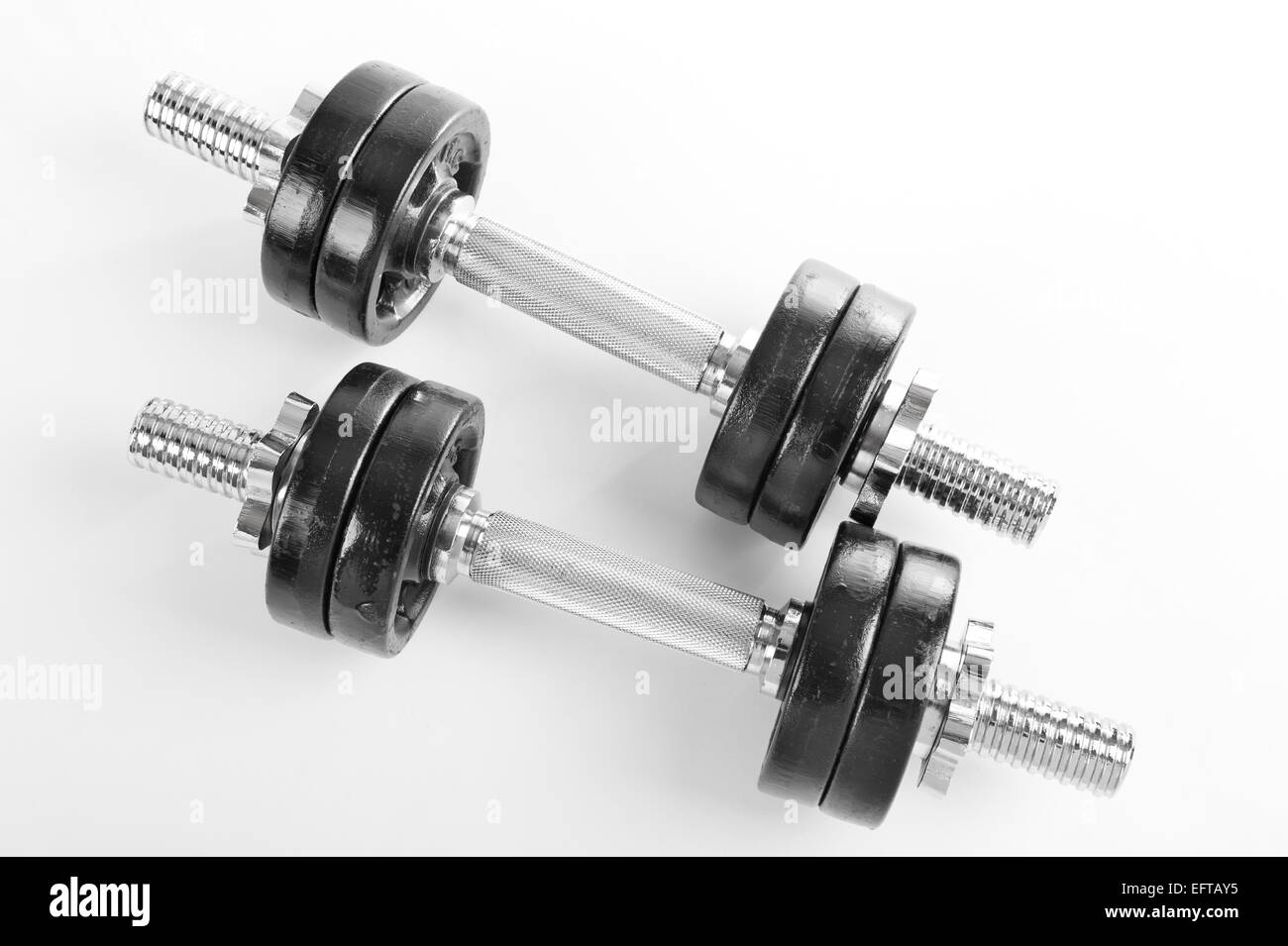 Chrome hand barbells weights Stock Photo - Alamy