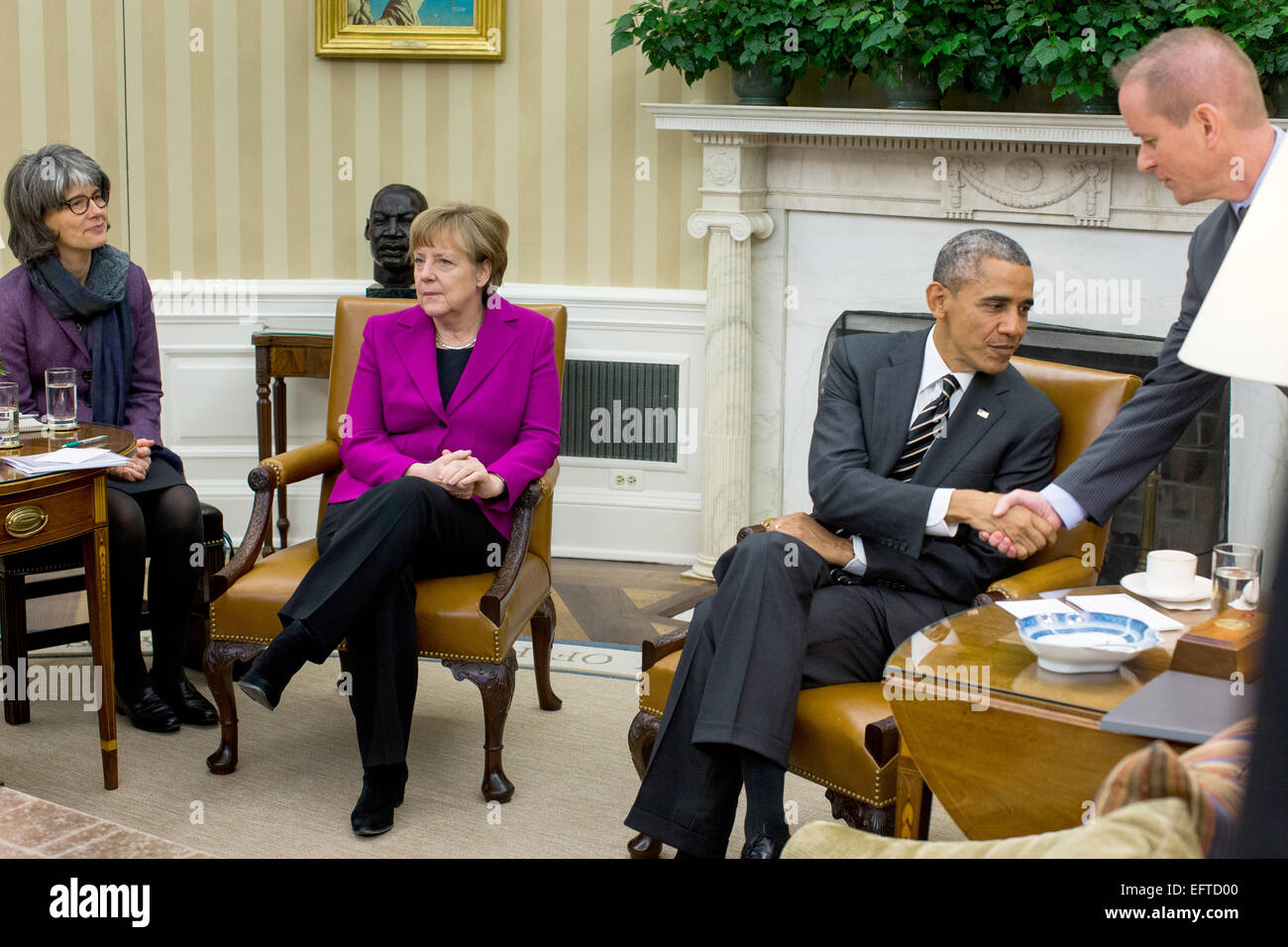 US President Barack Obama (C-R) and German Chancellor Angela Merkel (C ...