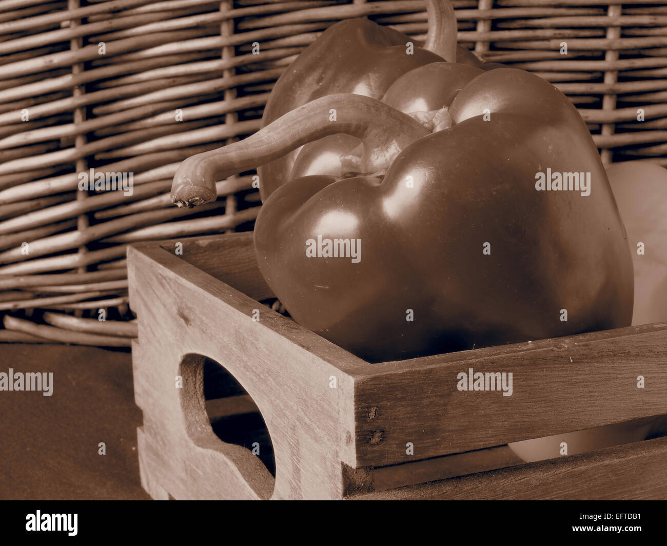 Red peppers in a wooden box for storage and transportation taken in ...