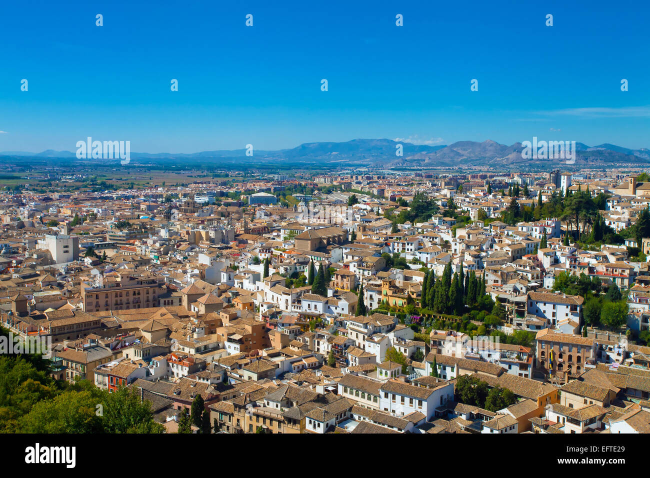 Panoramic view of city of Granada and its outskirts with distant ...