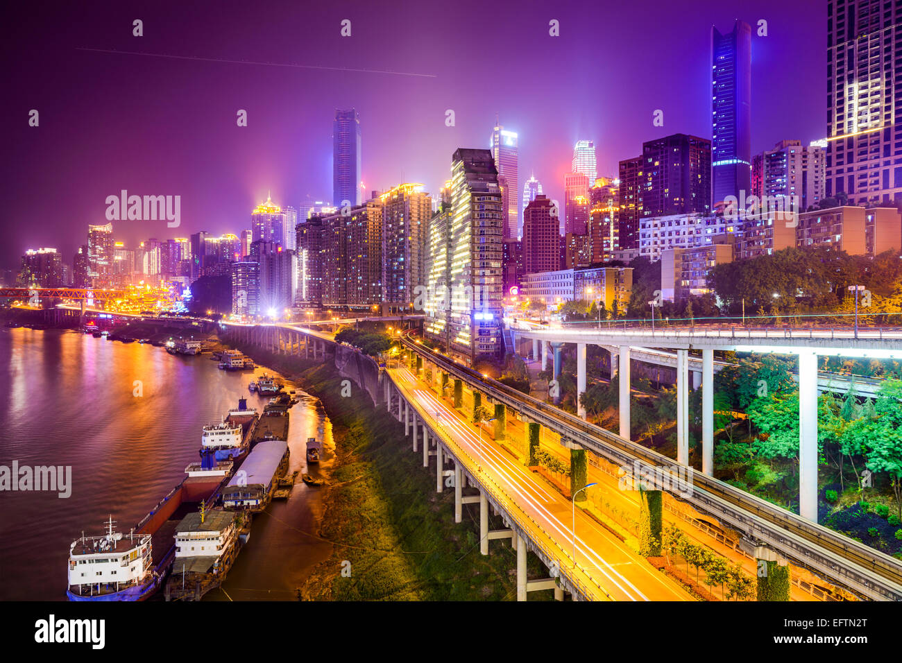 Chongqing, China riverside cityscape at night Stock Photo - Alamy