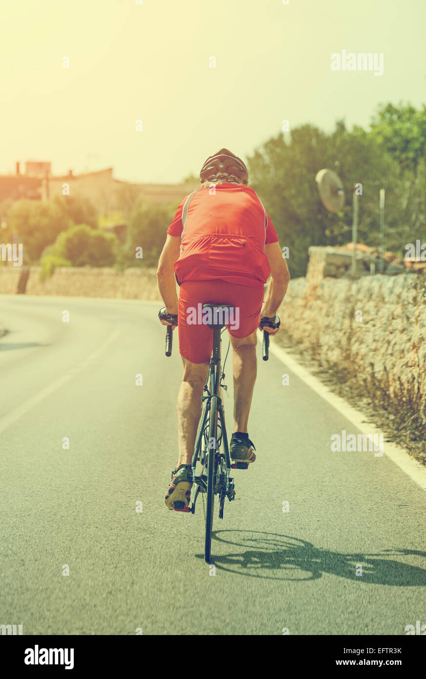 Male cyclist riding road hi-res stock photography and images - Alamy