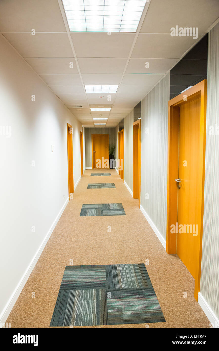 long corridor in a modern office building Stock Photo - Alamy