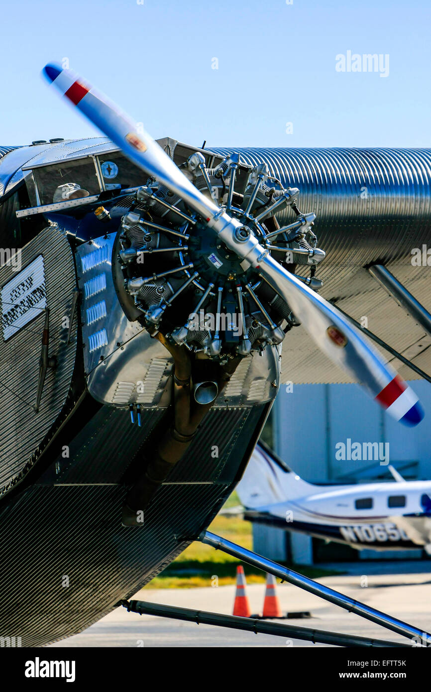 The 300 hp (220 kW) Wright J-6-9 Whirlwind nine-cylinder radial piston ...