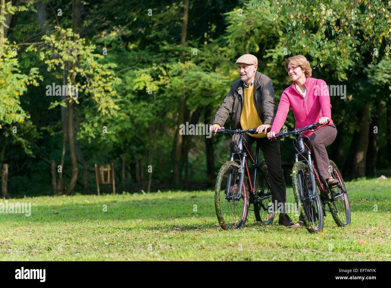 Mature couple bicycles hi-res stock photography and images - Alamy