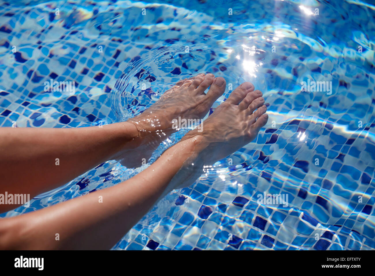 Man foot in swimming pool hi-res stock photography and images - Alamy