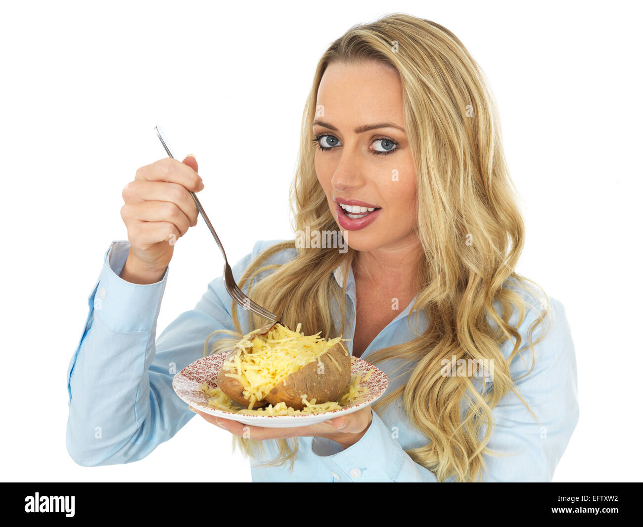 Happy Young Woman Eating A Freshly Baked Jacket Potato Filled With ...