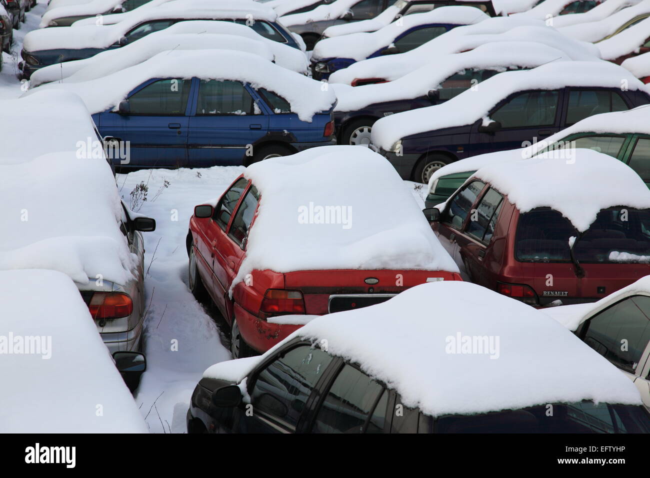 parking lot with cars covered by snow in winter. Photo by Willy ...